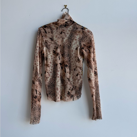 Callipygian | Tops | Callipygian Printed Mesh Turtleneck | Poshmark